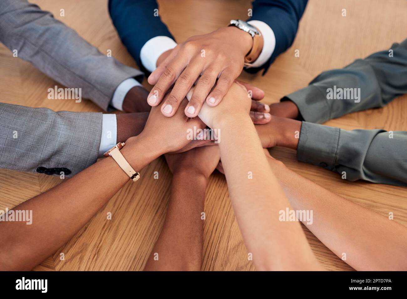 Support, partnership and hands of diversity business people stack together in solidarity, trust ...