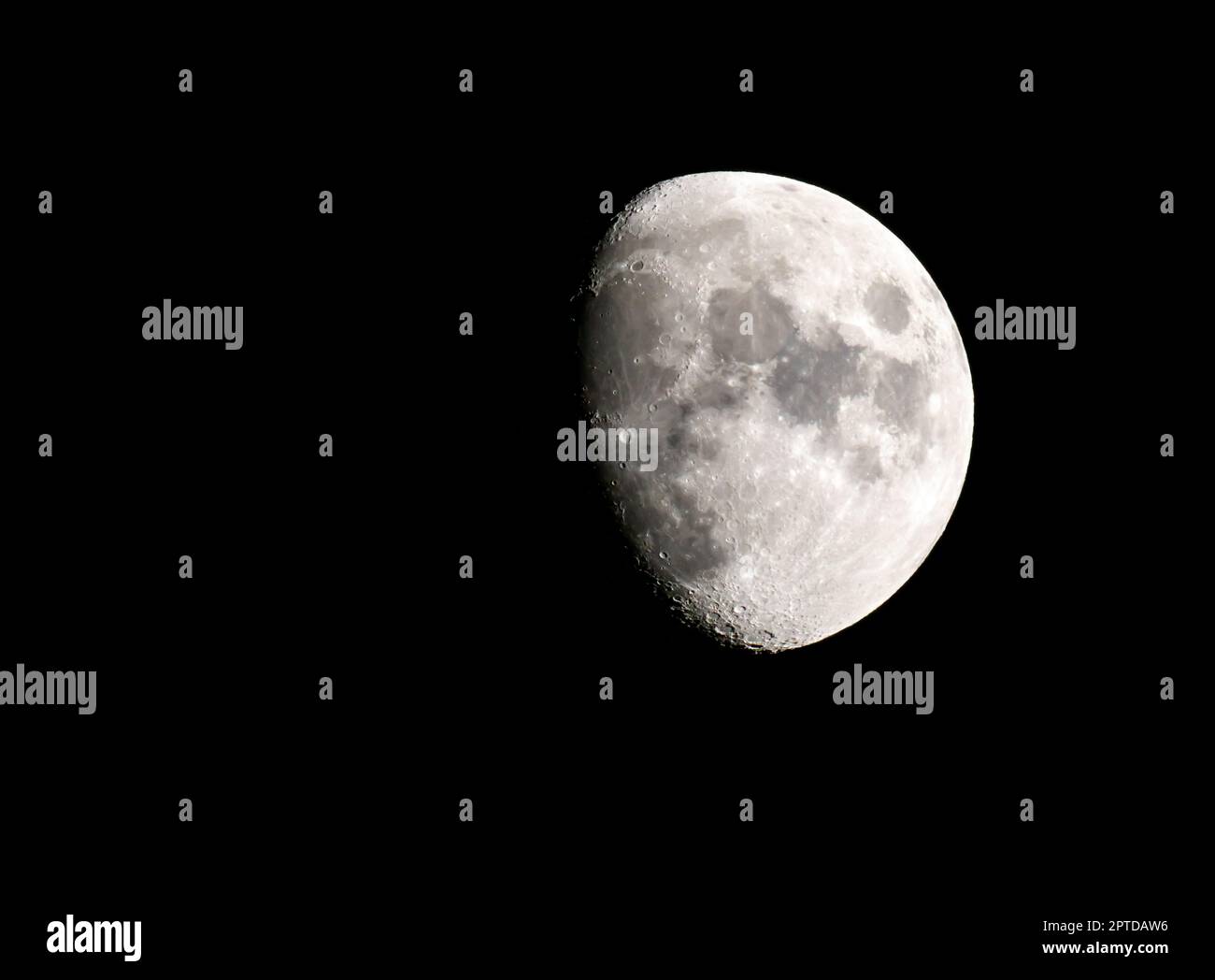 Three Quarter Full Moon Against Black Sky - 40+ MP Image Stock Photo ...