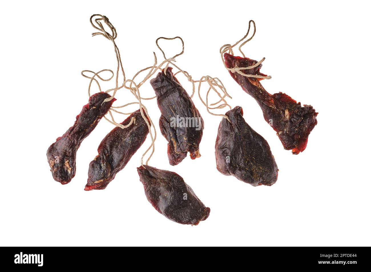 Overhead view of dried jerked deer or venison meat isolated on white ...