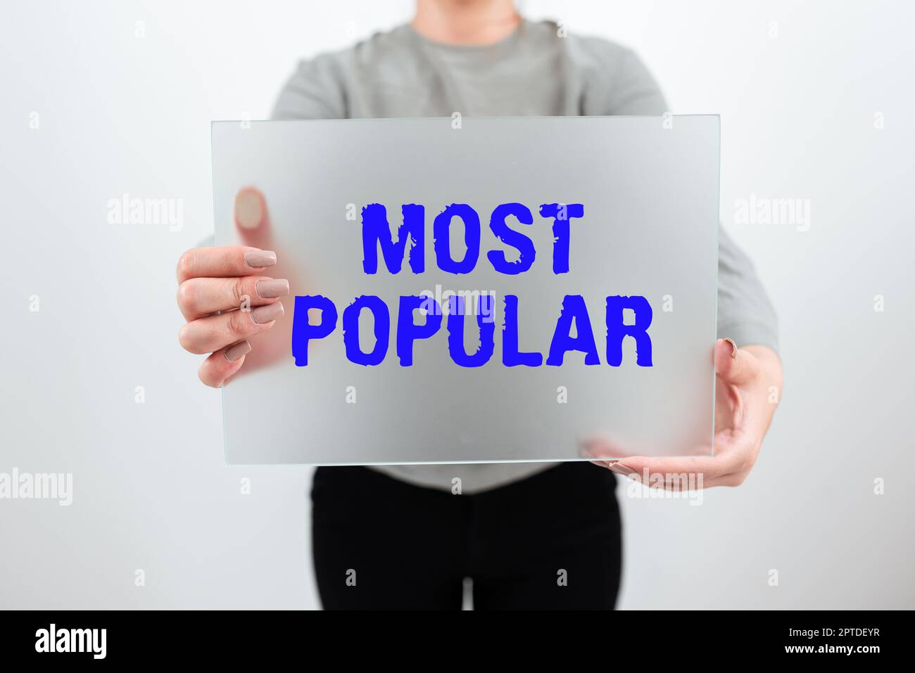 Sign displaying Most Popular, Word Written on Liked Followed Enjoyed by ...