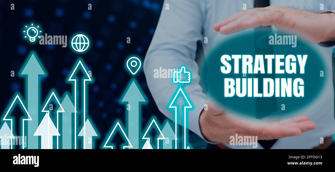 Hand writing sign Strategy BuildingLeveraging Buying and acquiring ...