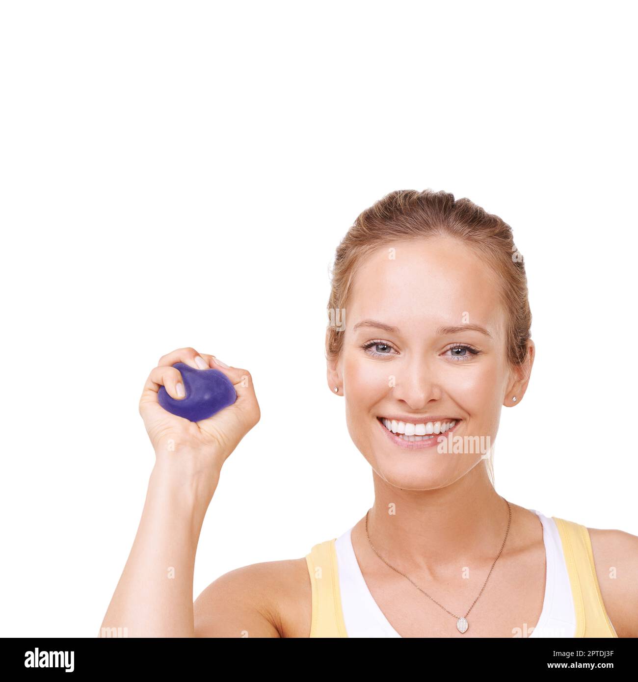 Building strong forearm muscles. Cropped view of a woman squeezing a ...