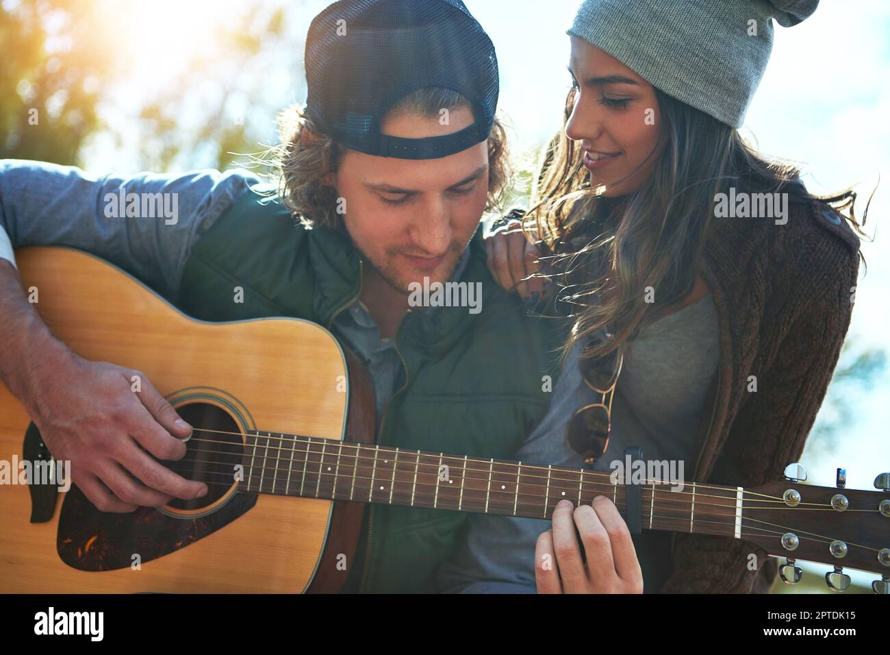 Hes stringing the right chord in my heart. a young man playing his ...