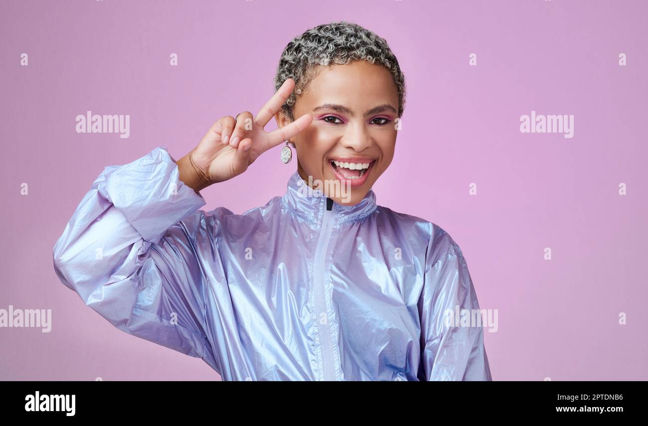 Fashion, peace hand sign and black woman in retro clothes on studio ...