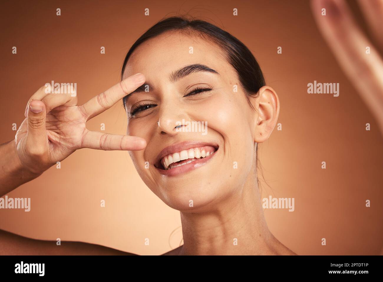 Face, peace sign and woman happiness selfie of a model with a funny ...