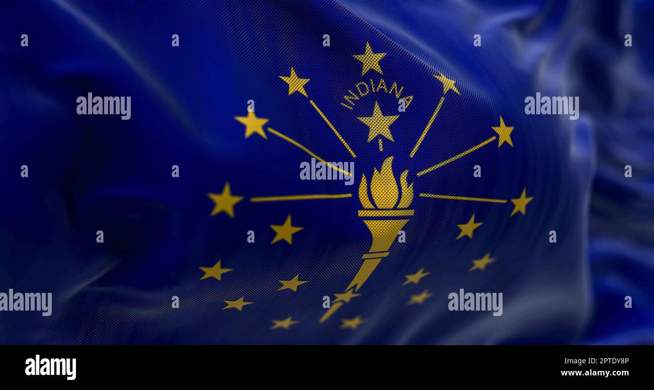 Close-up view of the Indiana state flag waving in the wind. Indiana is ...