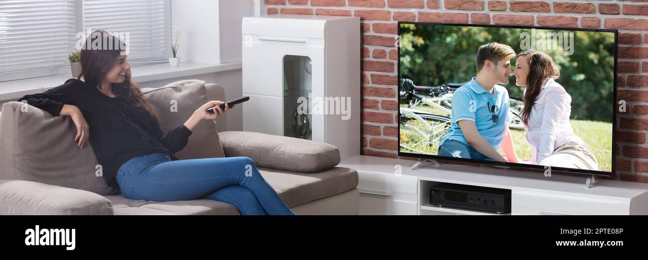 Watching Soap Opera Television. Watch TV On Couch Stock Photo - Alamy