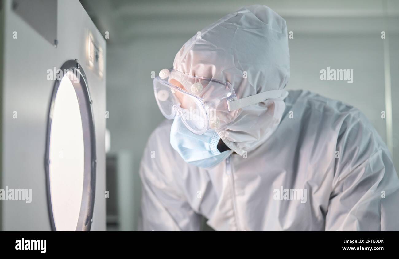 Science, research and laboratory in ppe working dangerous material ...