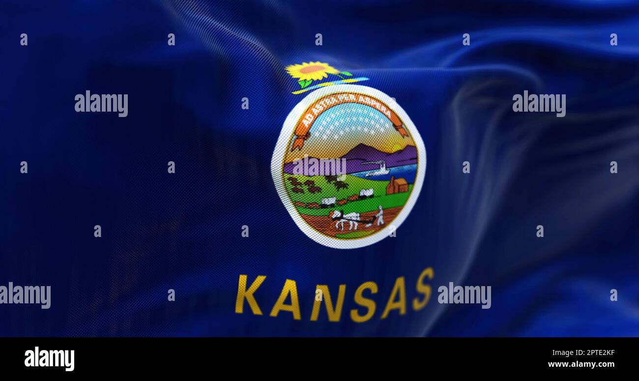 Close-up view of Kansas state flag waving in the wind. Kansas is a ...