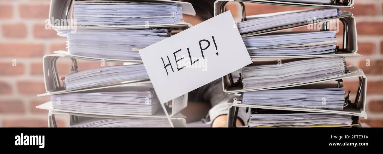 Overworked Business Woman With White Help Flag Sign Stock Photo - Alamy