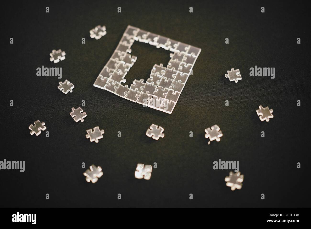Transparent puzzle pieces hi-res stock photography and images - Alamy
