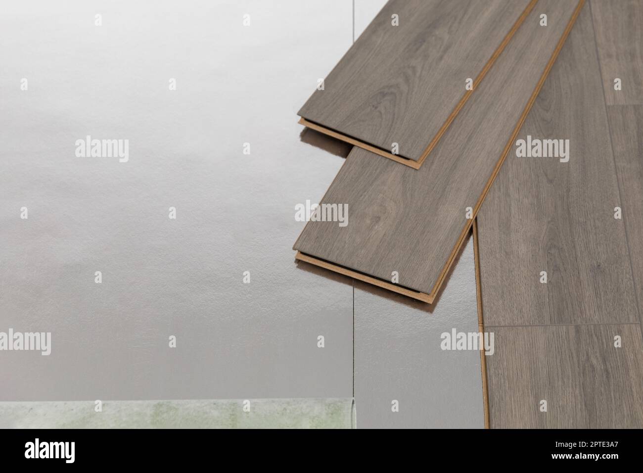 Installation of floating floor, underlay with sheets of laminate. Home ...