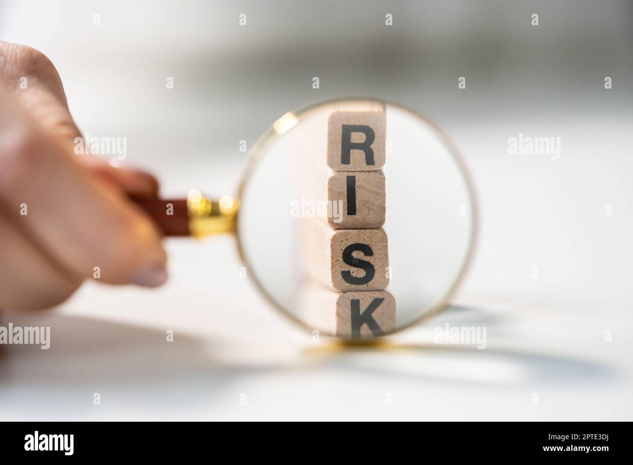 Risk Detection Using Magnifying Glass. Wooded Block Word Stock Photo ...