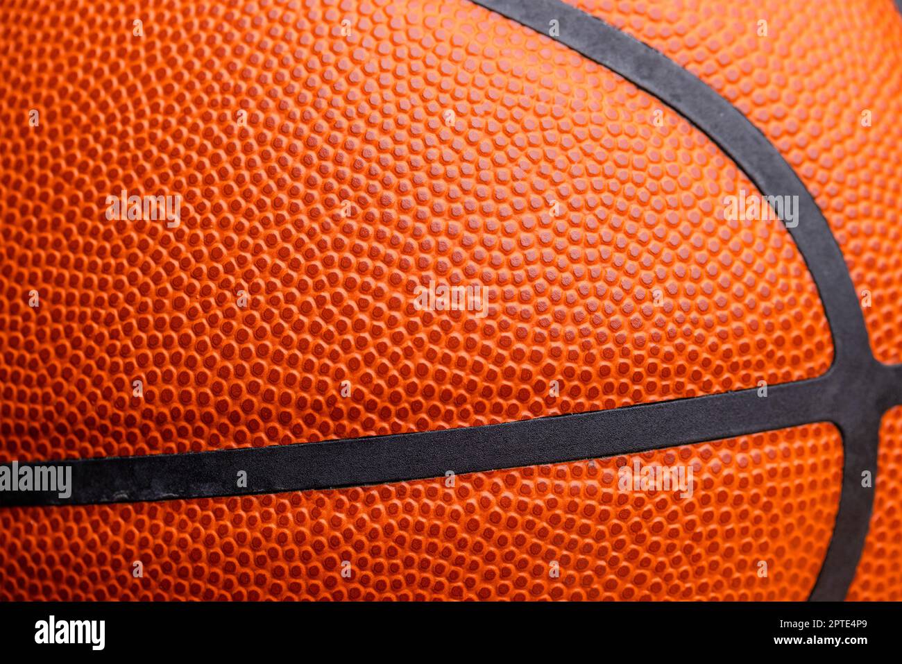Texture of basketball skin close up Stock Photo - Alamy