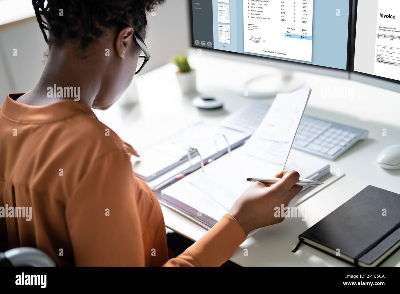Professional African American Business Woman Doing Invoice Audit Stock ...