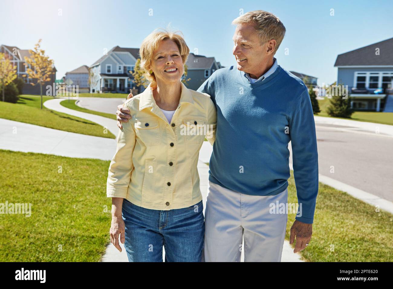 Never stop fanning that romantic spark. a happy senior couple waking ...