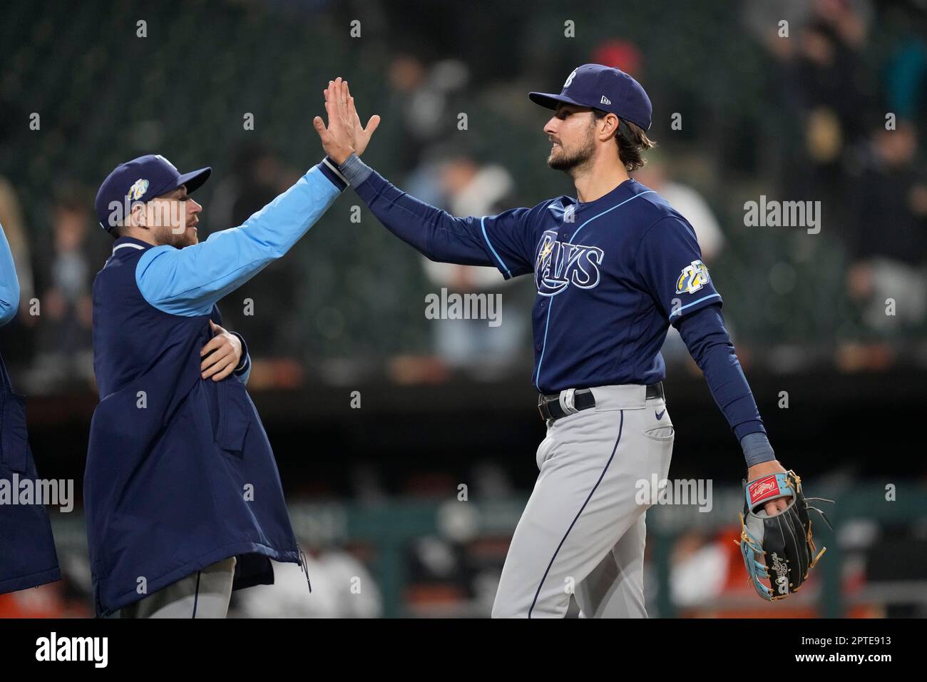 Tampa Bay Rays' Brandon Lowe, left, and Josh Lowe celebrate the team's ...
