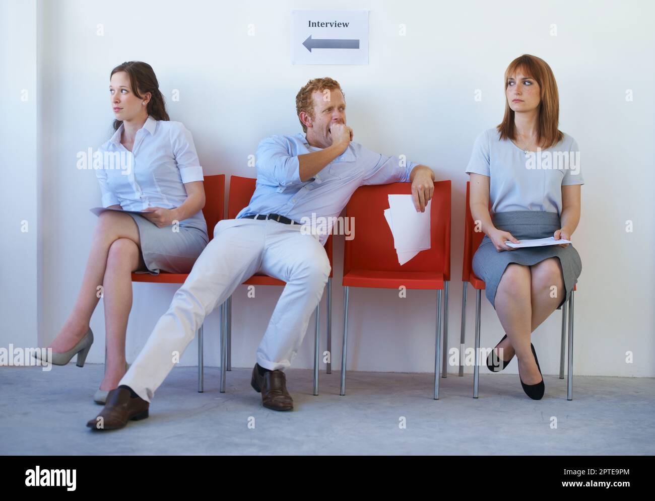 Two young men waiting job interview hi-res stock photography and images ...