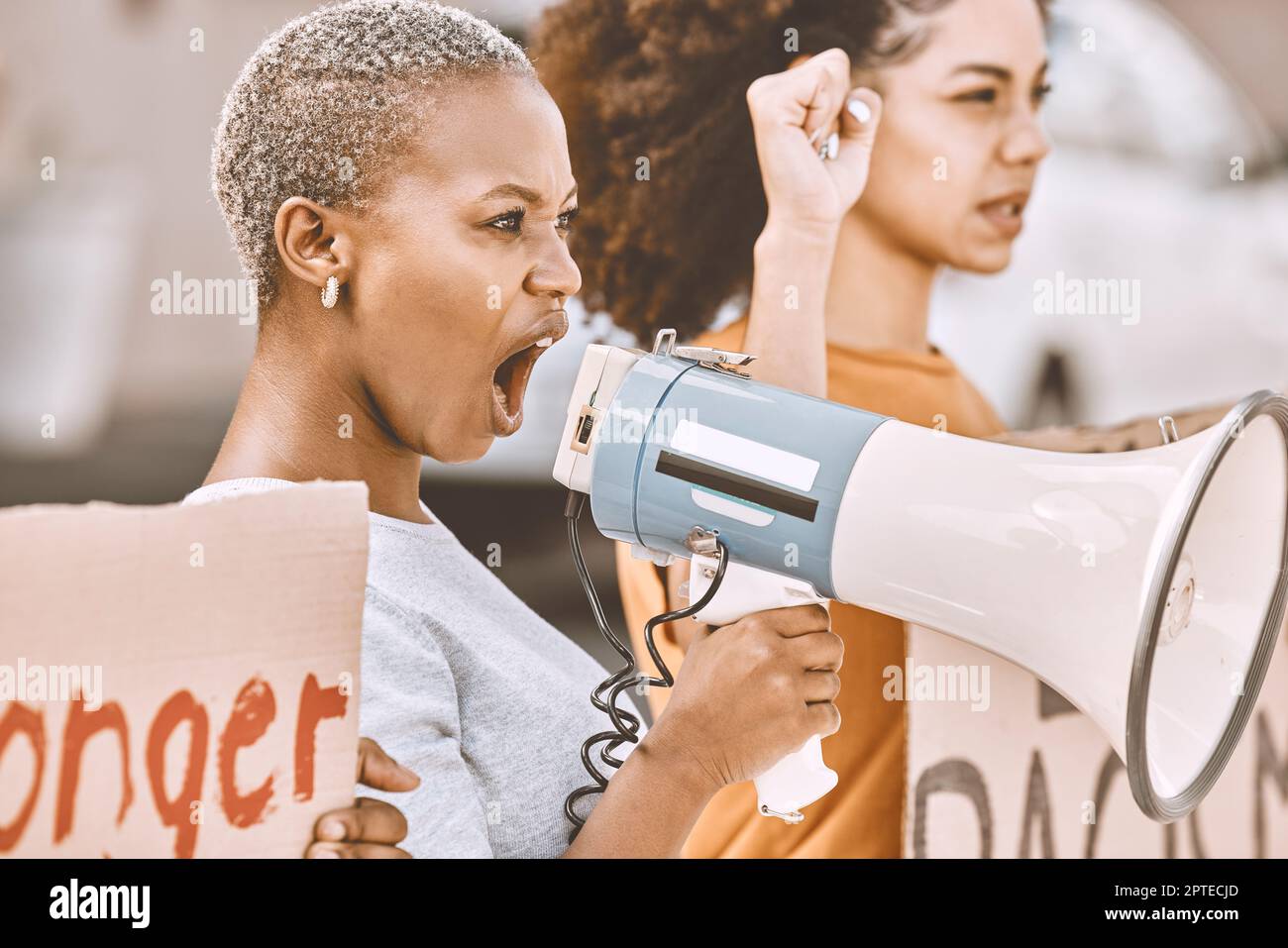 Protest, angry and black woman with a megaphone as leadership for ...