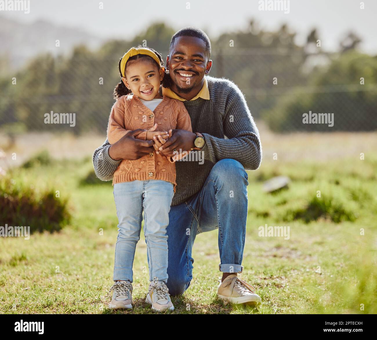 Park, portrait and father hug child for nature holiday, outdoor ...