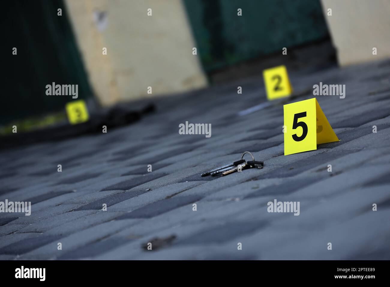 Evidence with yellow CSI marker for evidence numbering on the ...