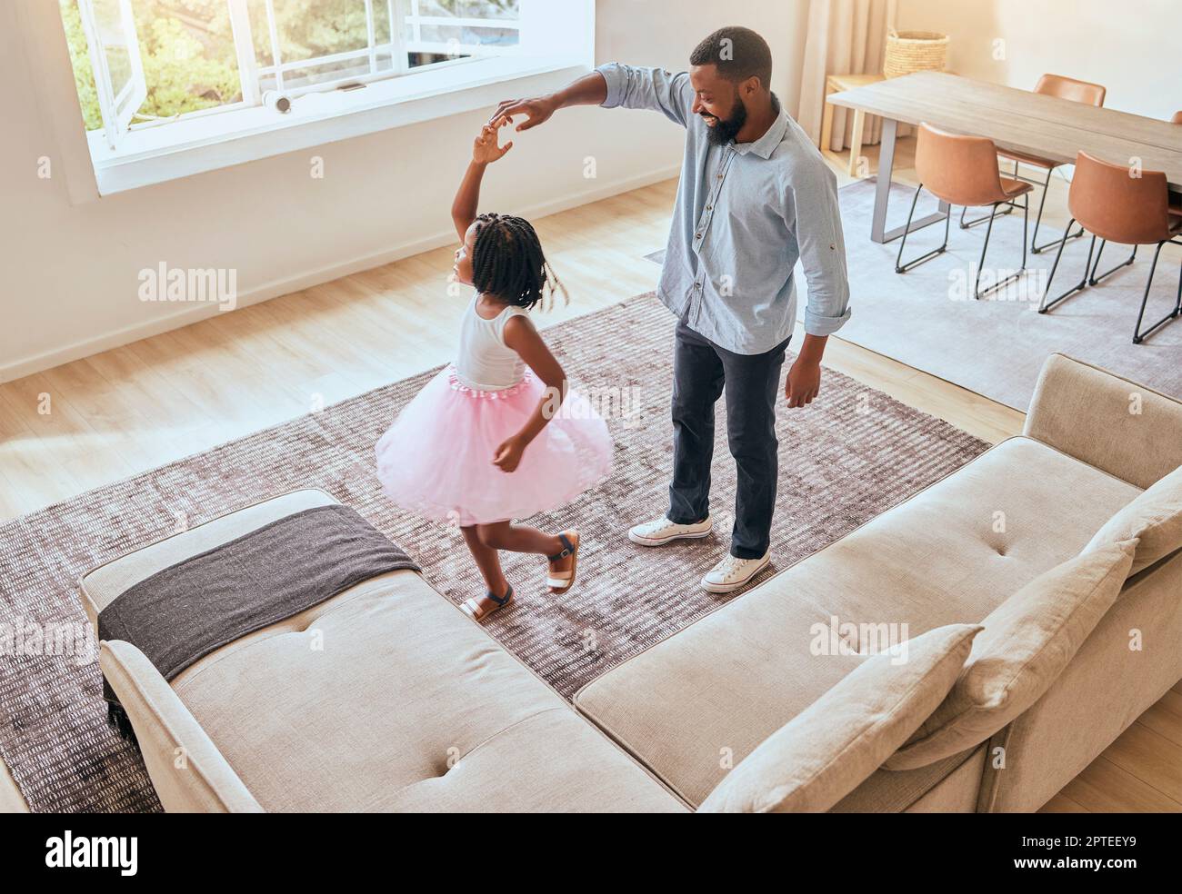 Man, father or girl ballet dancing in living room of house or happy ...