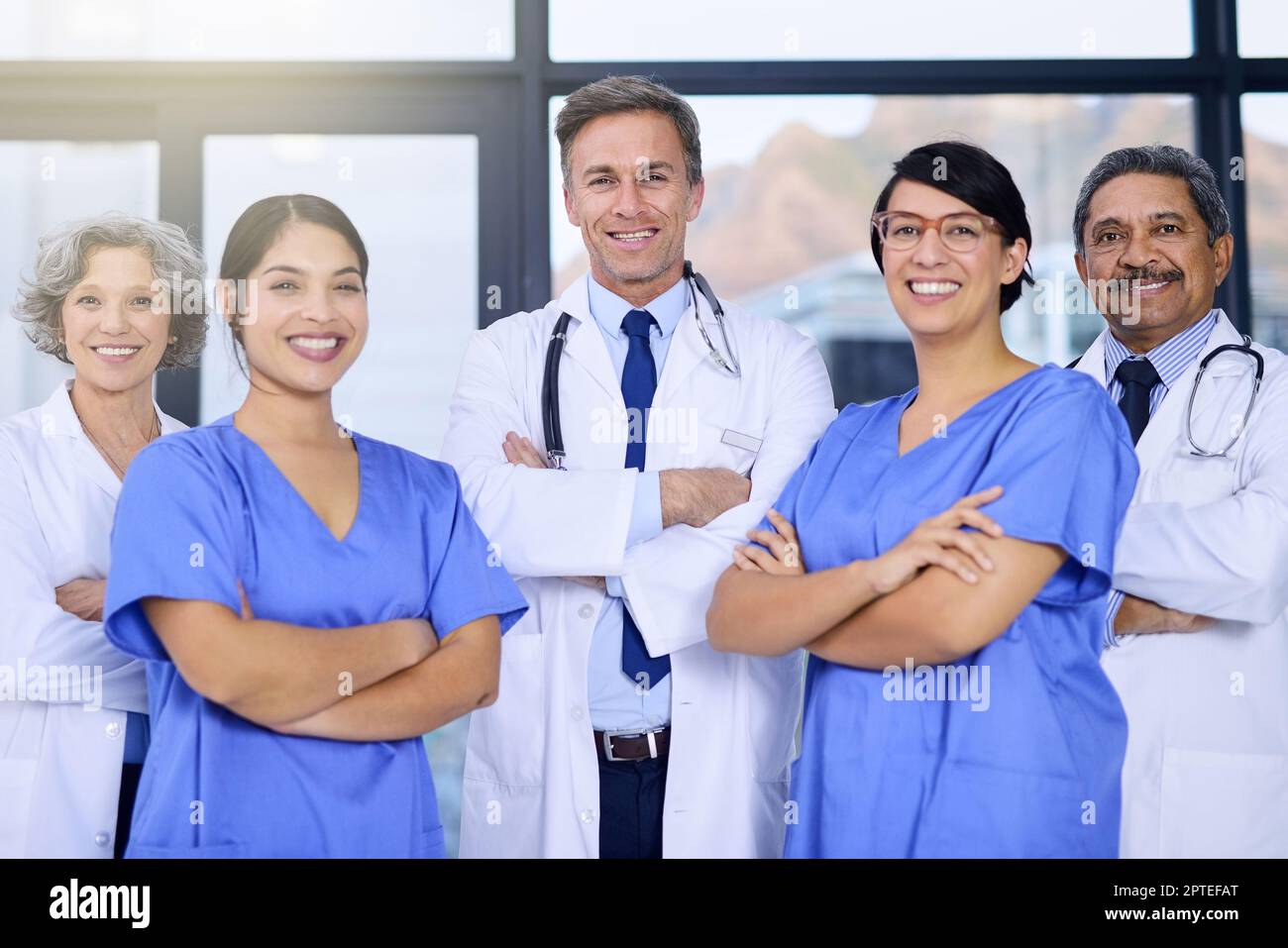 We always put our patients first. Portrait of a team of medical practitioners standing together ...