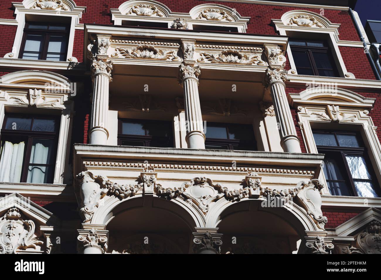 historicist facade with decorated balcony and columns in the belgian ...