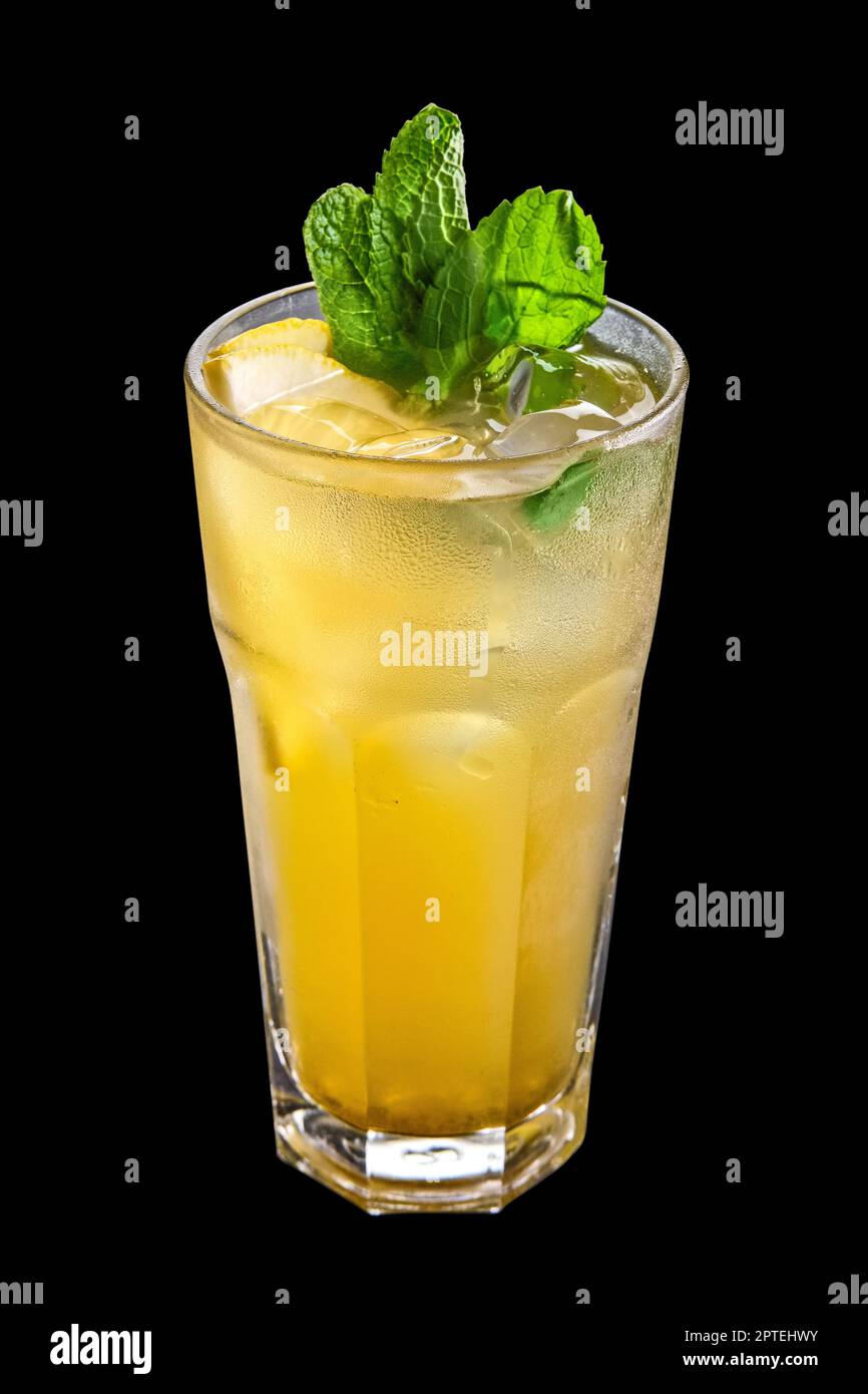 Cold citrus lemonade isolated on black background Stock Photo - Alamy