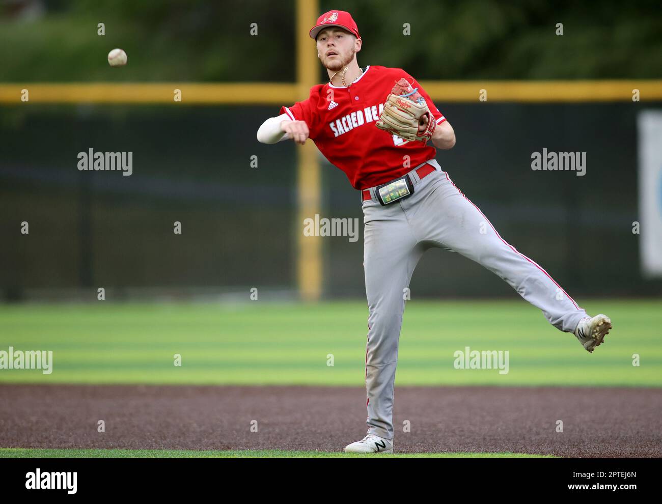 Sacred Heart infielder Sam Mongelli (2) throws during an NCAA baseball ...