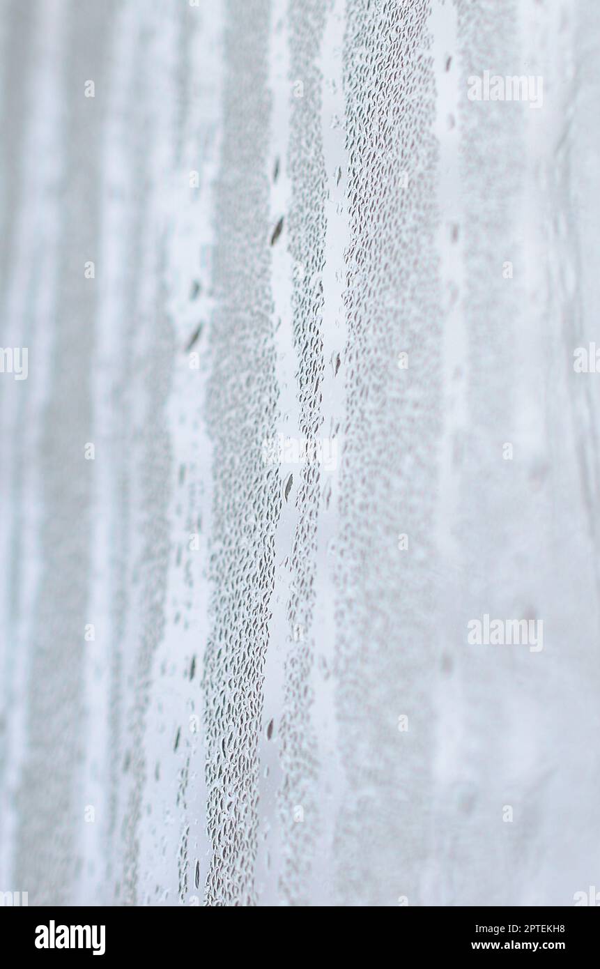 The texture of a misted glass with a lot of drops and condensation ...