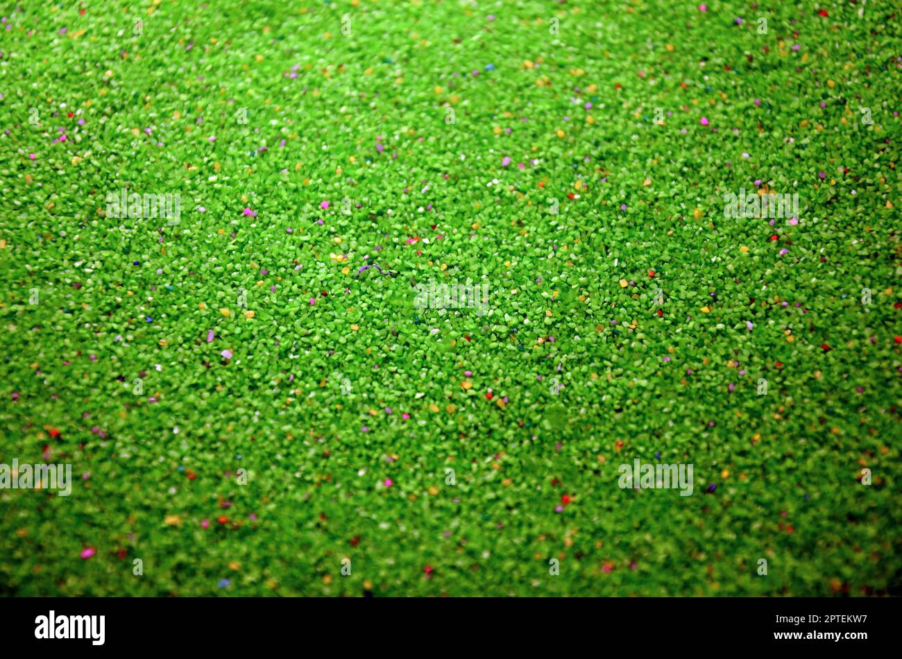 Texture of a colored granular sand close up. Green grains Stock Photo ...