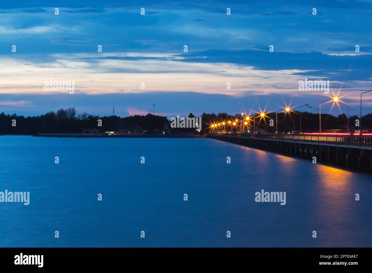 Twilight of the sunset with the Laem Sok Bridge Landscape Stock Photo - Alamy