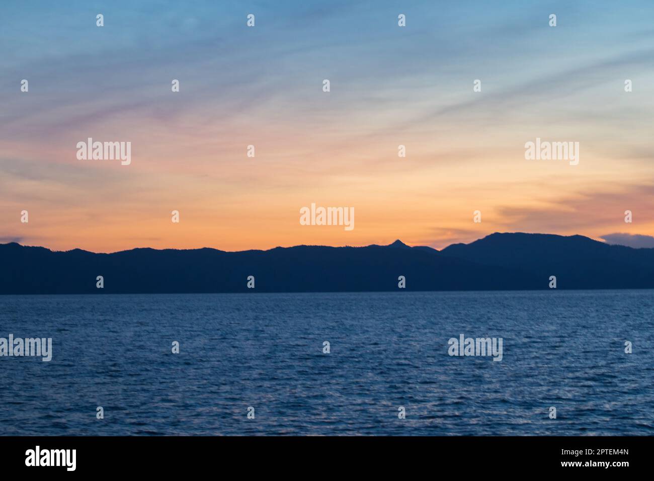 Twilight light of the sunset with beautiful sea landscape Stock Photo ...