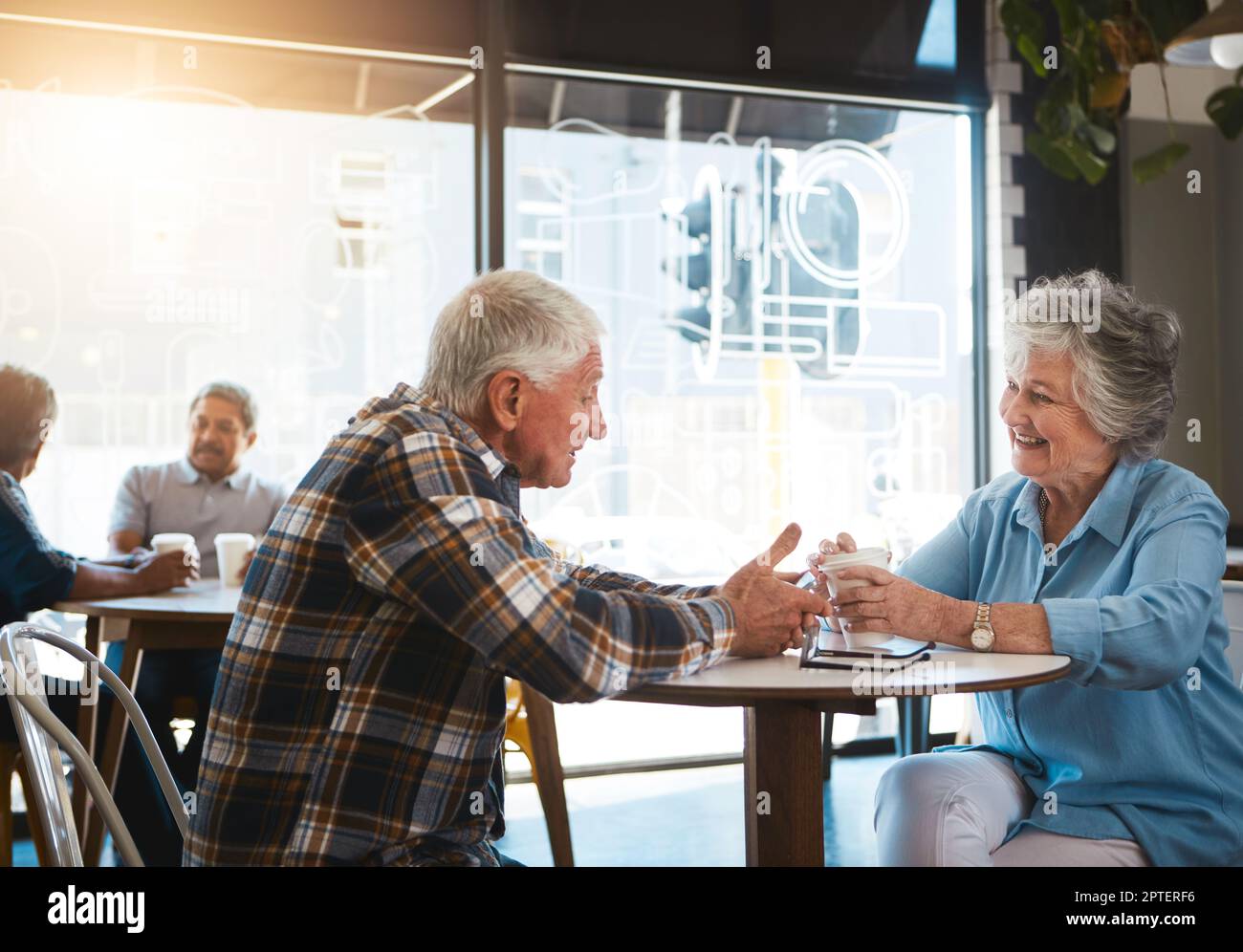Good communication between two aging partners. a senior couple out on a ...