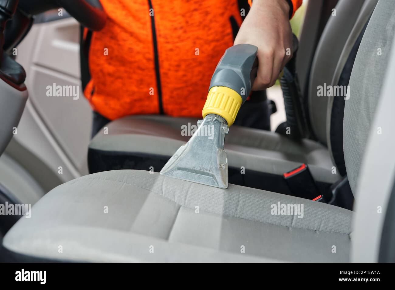 car dry cleaning. Light gray textile seats chemical cleaning with ...