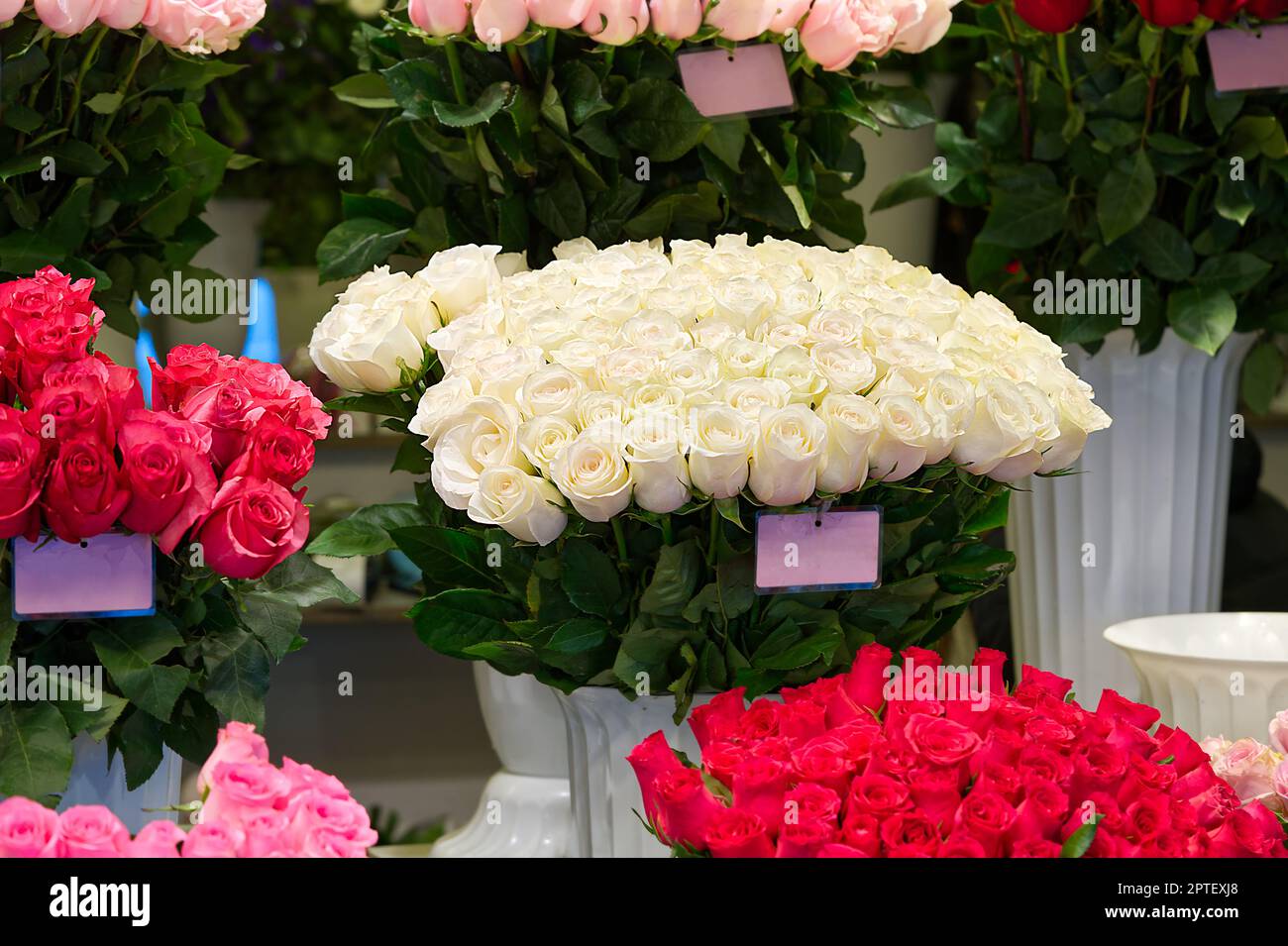Colorful roses bouquet display in front of flower shop. Flower ...