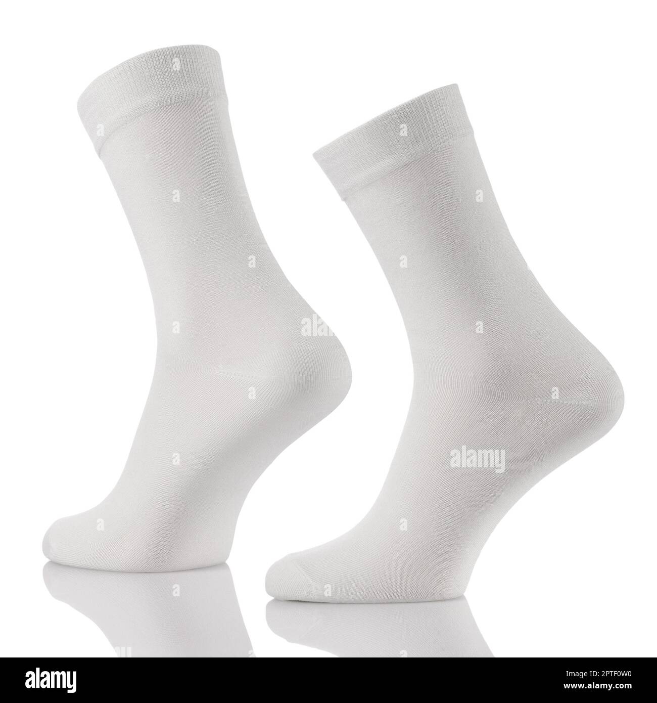Close up of white cotton long sock on invisible foots isolated on white ...