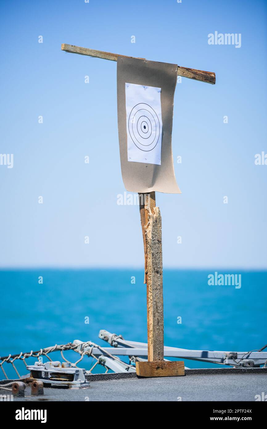 Color image of a paper shooting target on a pole Stock Photo - Alamy