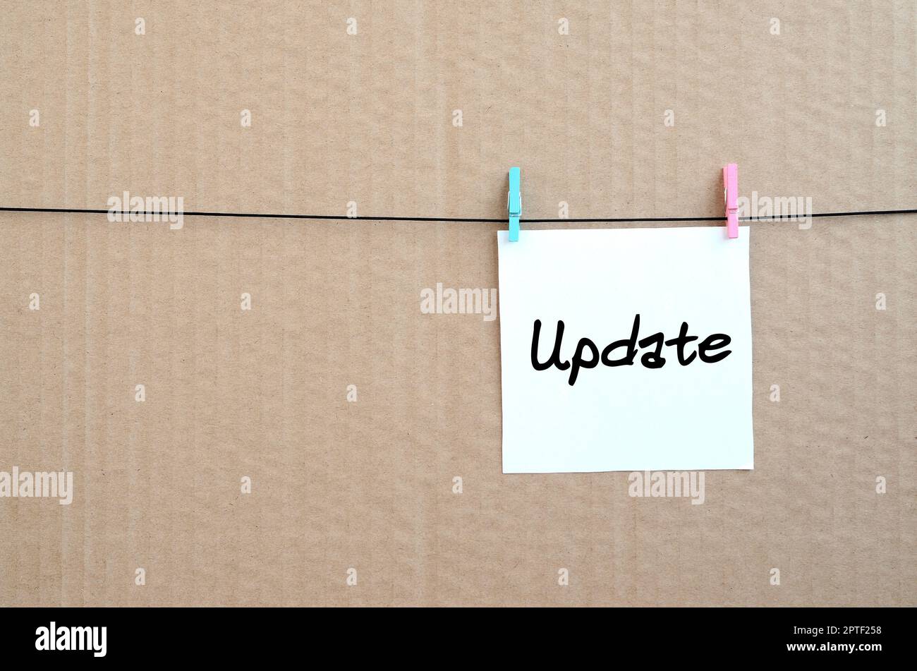 Update. Note is written on a white sticker that hangs with a clothespin ...