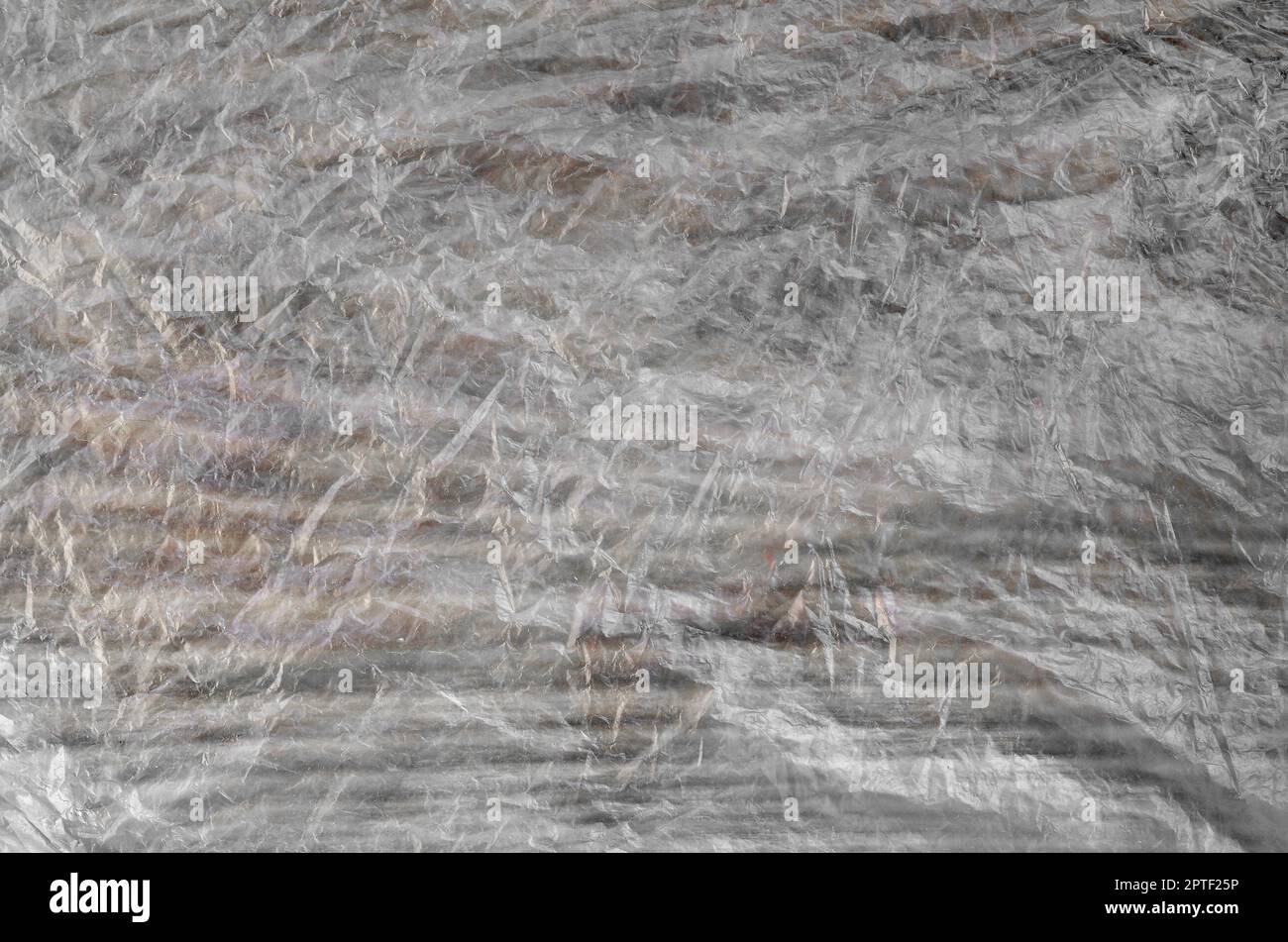 Texture of cellophane material with many folds and bends Stock Photo ...