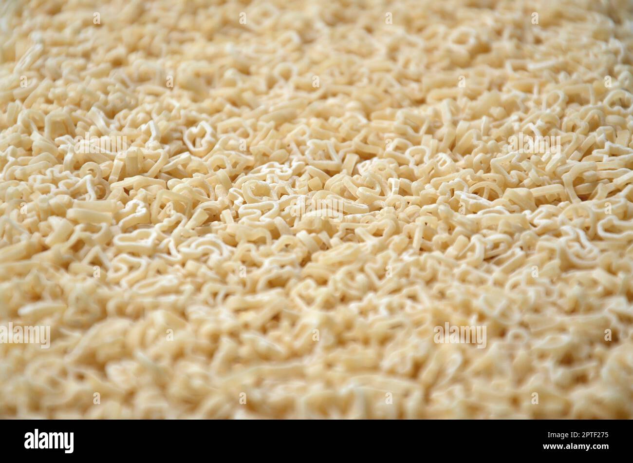 Uncooked curly pasta pattern hi-res stock photography and images - Alamy