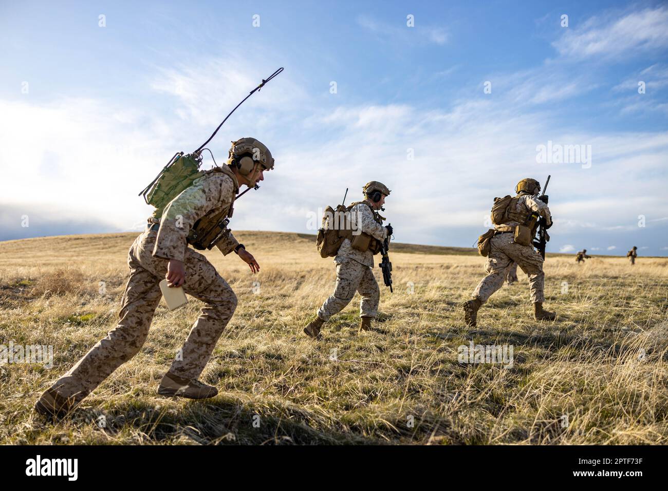 U.S. Marines with 1st Marine Division maneuver to cover while taking ...