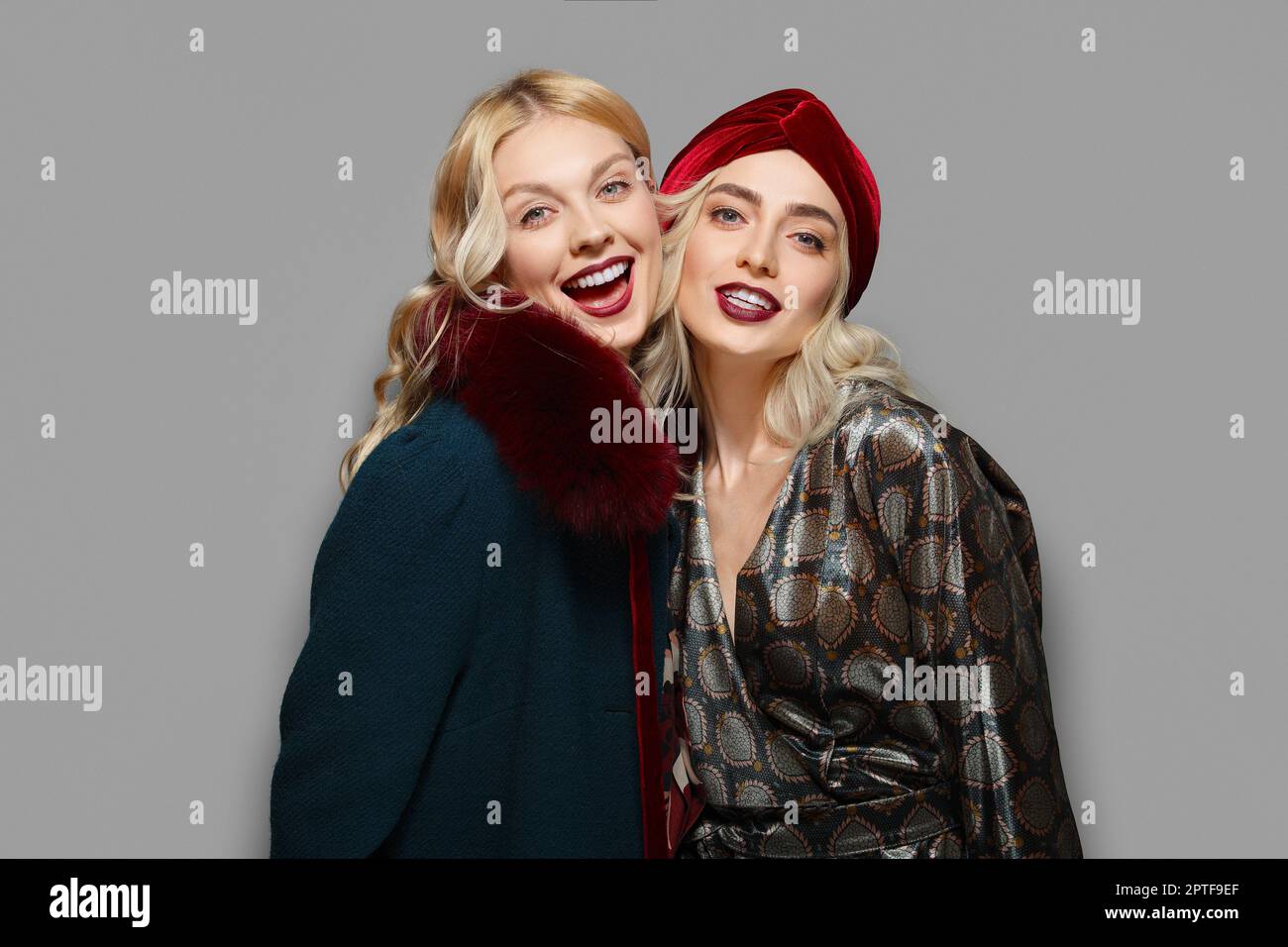 Two girls hugging laughing hi-res stock photography and images - Alamy