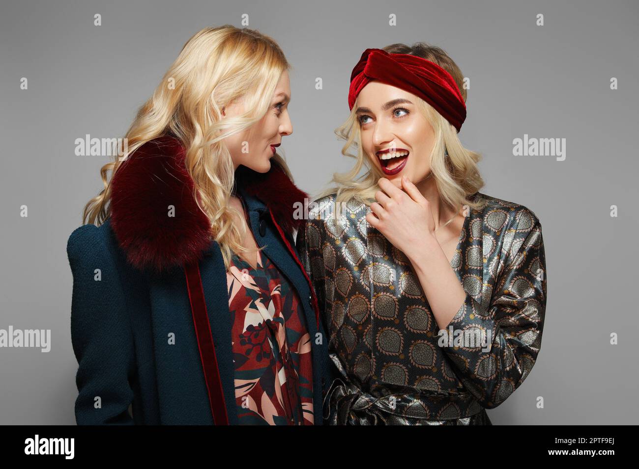 Two happy girls emotionally twitching. Expressing the emotions., Two ...