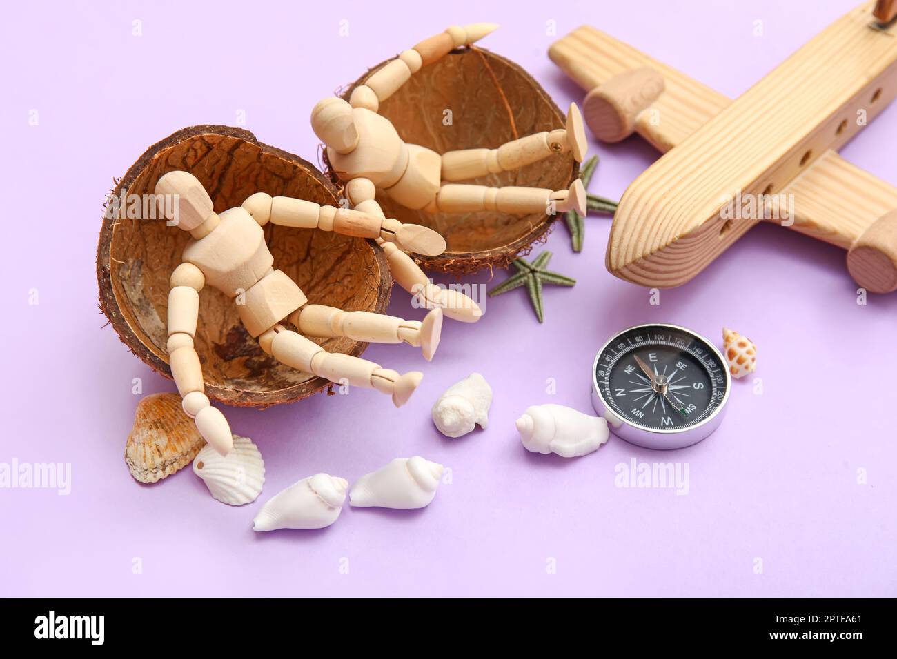 Composition with wooden plane, compass and mannequins sitting in ...