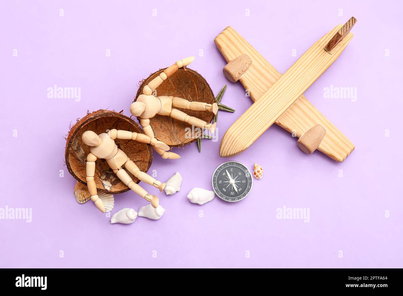 Composition with wooden plane, compass and mannequins sitting in ...