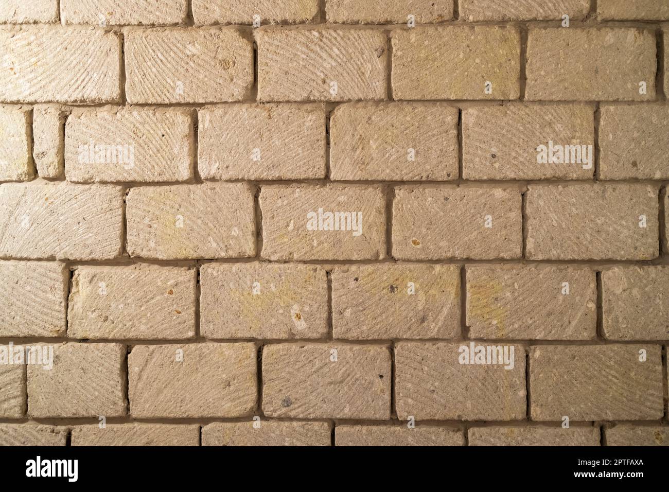 wall built of stone blocks of tuff Stock Photo - Alamy