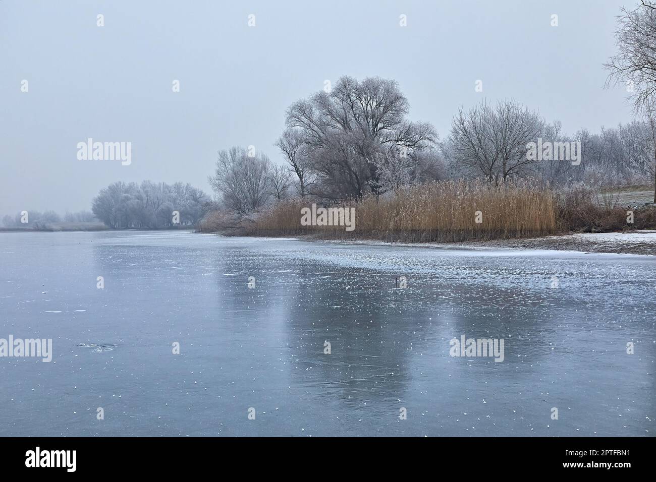 Frozen lake surface in cold winter Stock Photo - Alamy