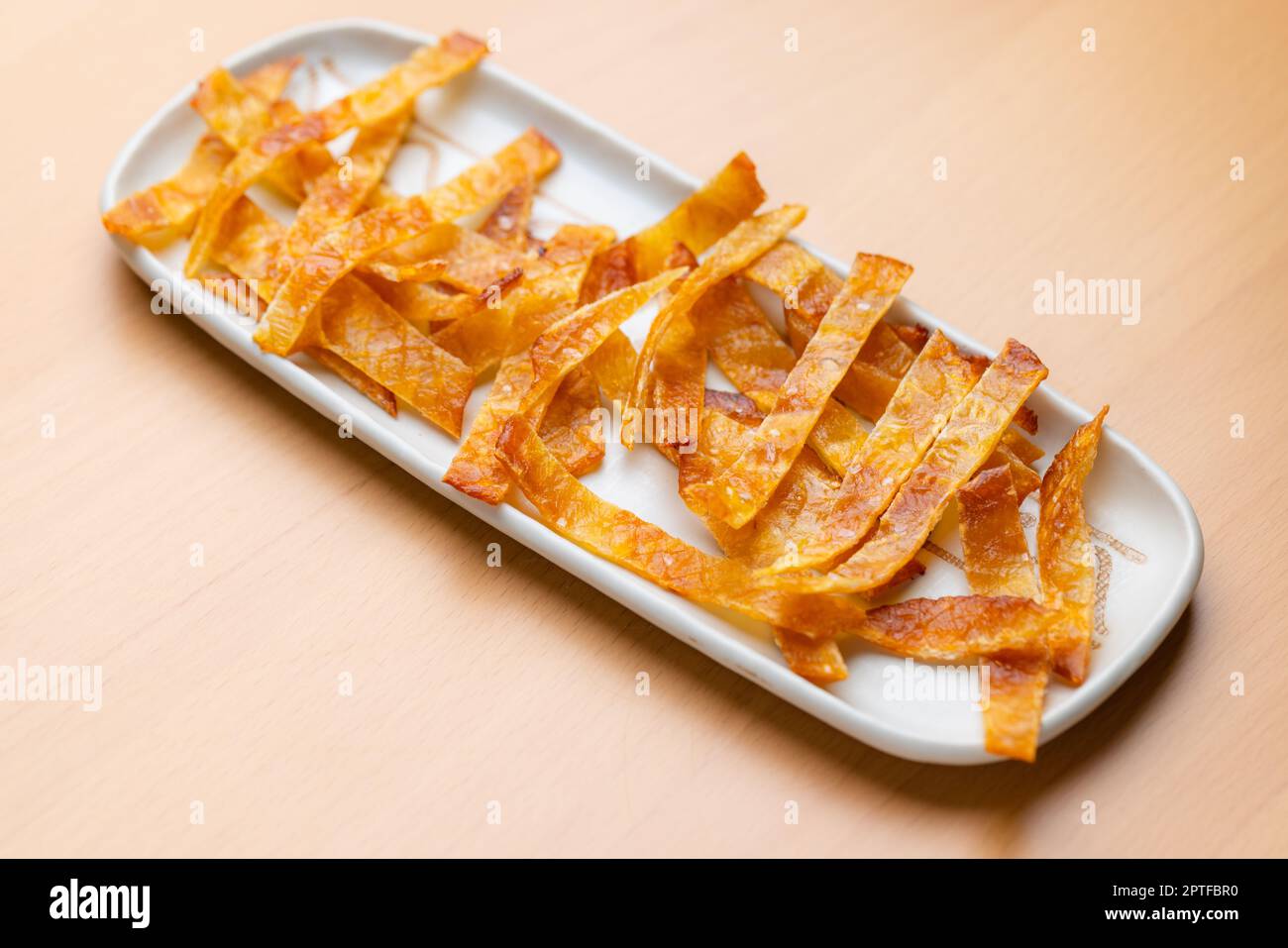 Cooked dried fish fillet snack Stock Photo - Alamy